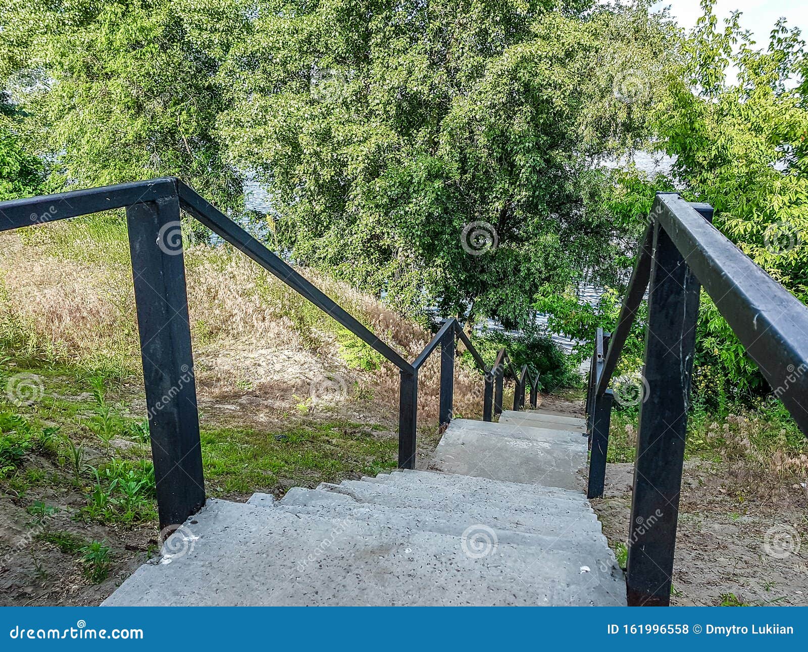 Concrete Steps Leading Down To the Beach, Pond through the Trees Stock ...