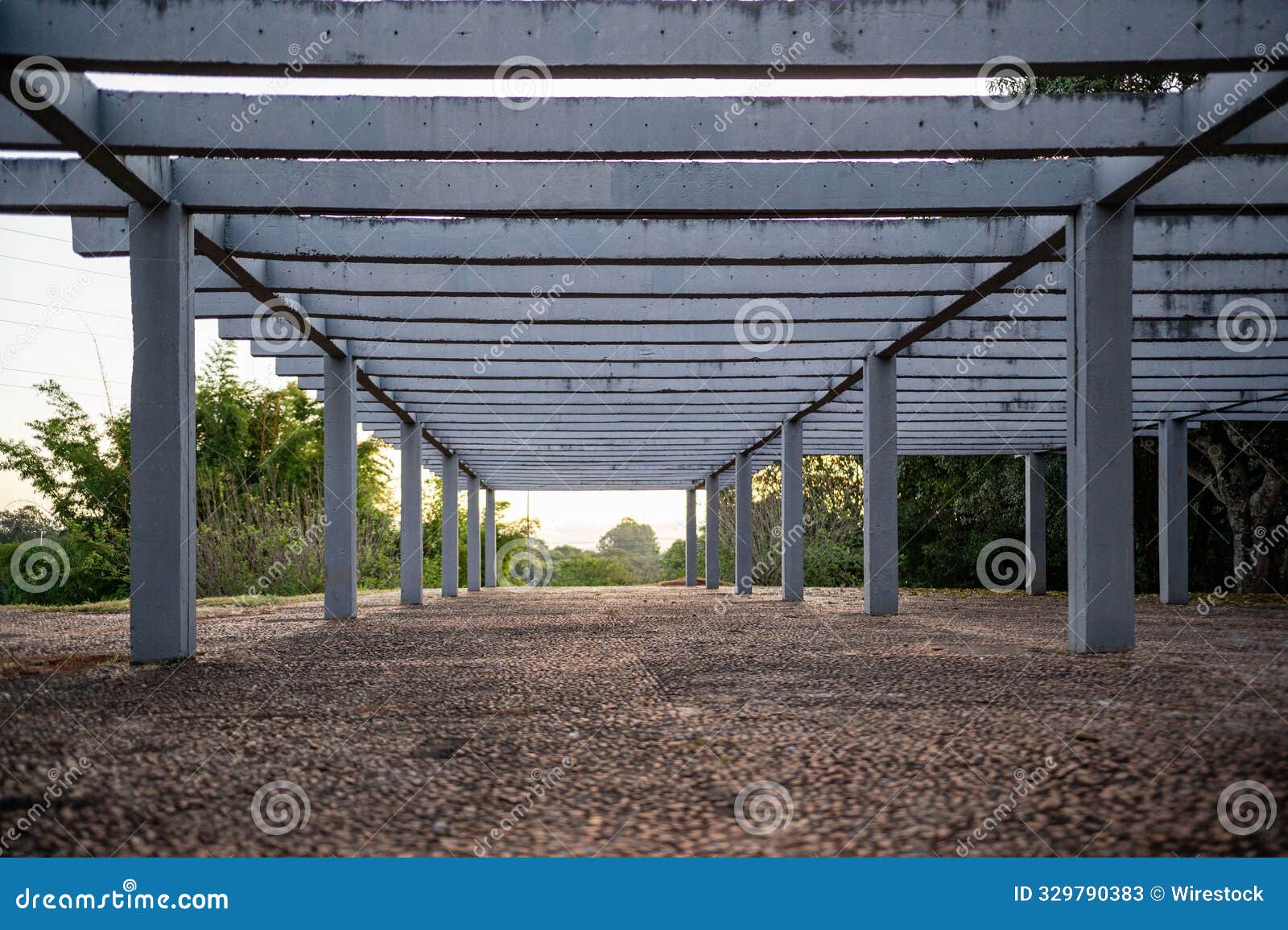 Concrete Structure with a Pathway Leading To a Green Landscape in the ...