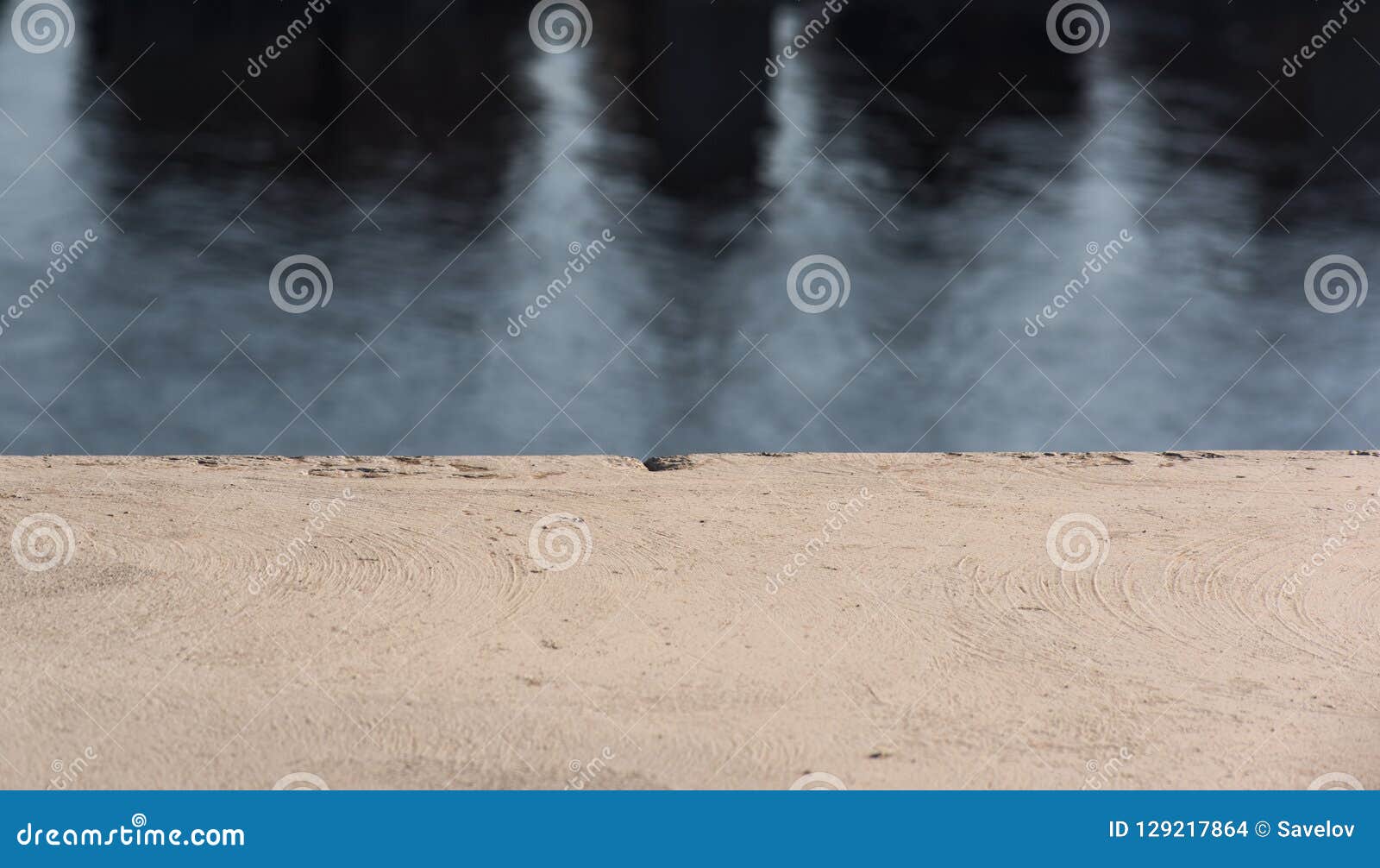 Concrete Surface and Blurred Water with Reflection Stock Photo - Image ...