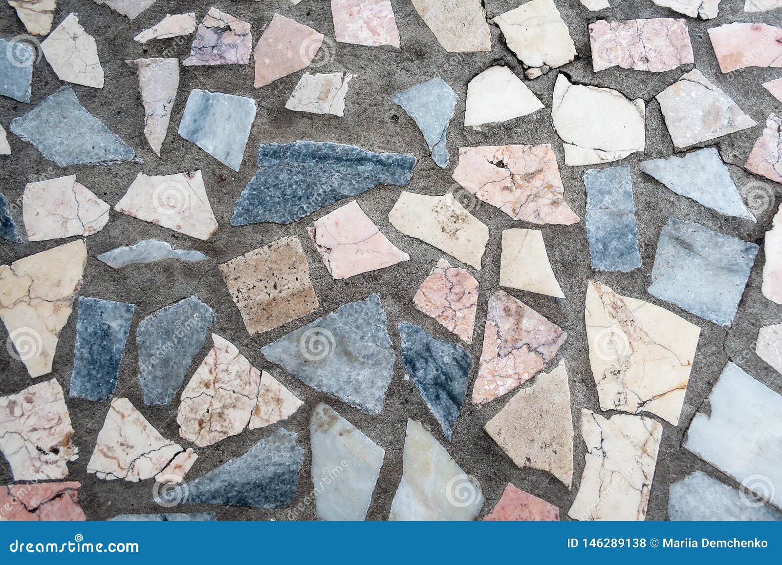Concrete Surface with Multiple Patches of Colored Stones Stock Photo ...