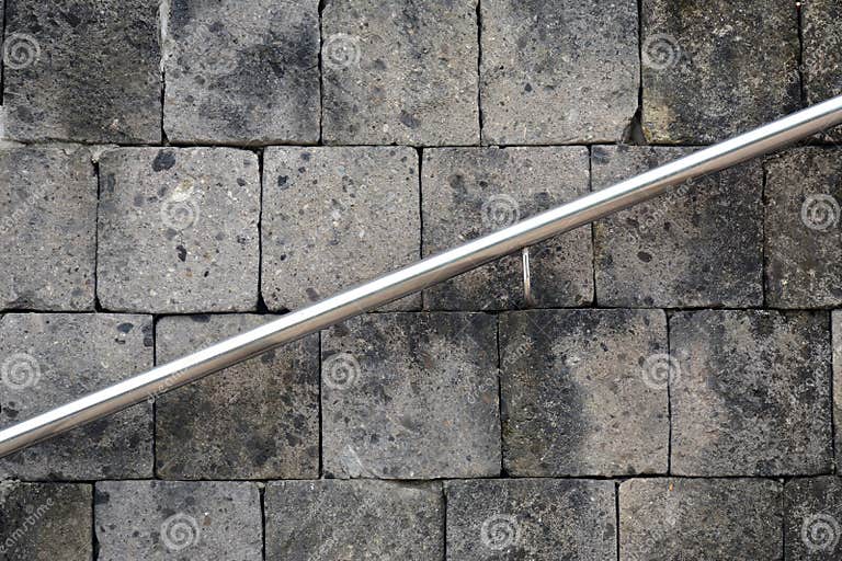 Concrete Tile Cladding Background Texture with Stainless Steel Railing ...