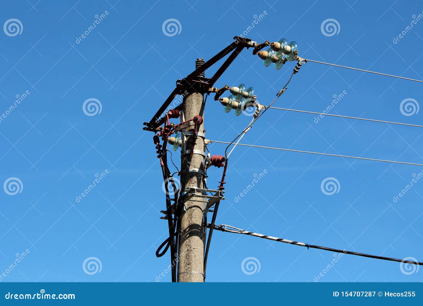 Concrete Utility Pole with Multiple Electrical Wires Connected with ...