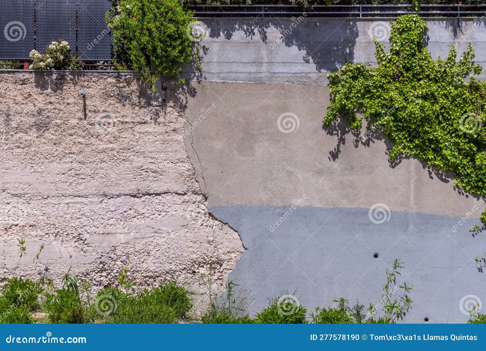 A Concrete Wall in the City To Which Half of the Plaster Stock Photo ...
