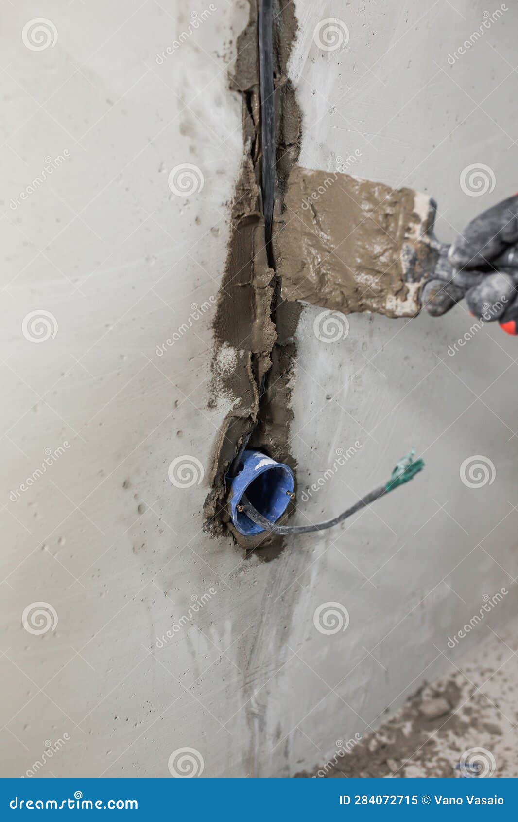 Concrete Wall Cutting and Concealed Wiring during Electrical Work Stock ...
