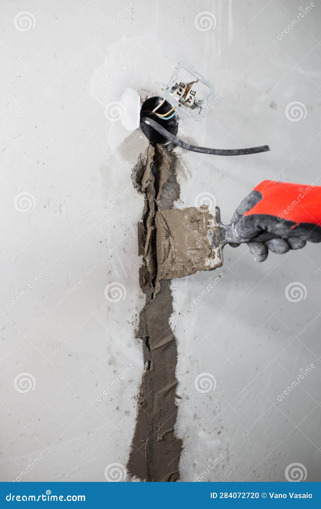 Concrete Wall Cutting and Concealed Wiring during Electrical Work Stock ...