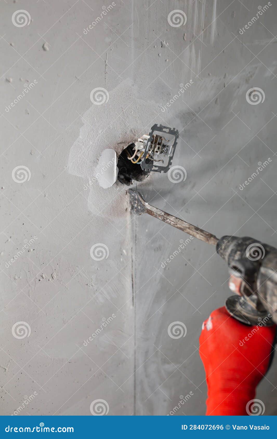 Concrete Wall Cutting and Concealed Wiring during Electrical Work Stock ...