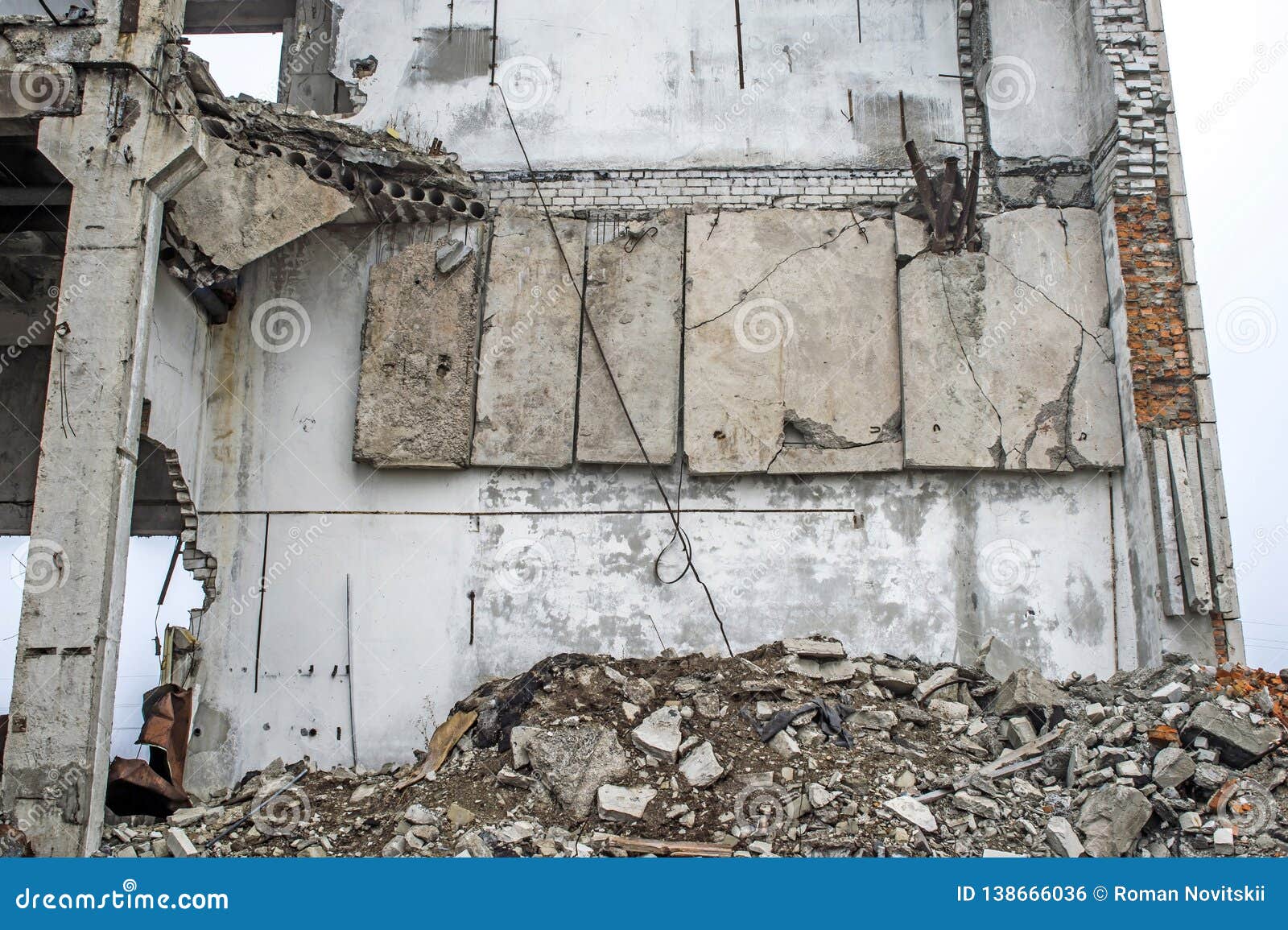 The Concrete Wall of the Destroyed Large Building with Hanging Concrete ...
