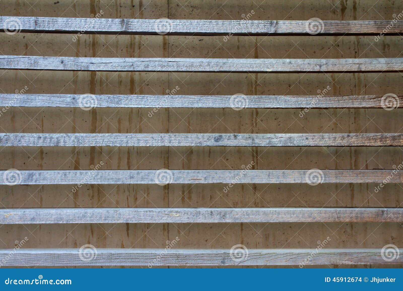 Concrete Wall with Grayed Wood Struts Stock Photo - Image of grayed ...