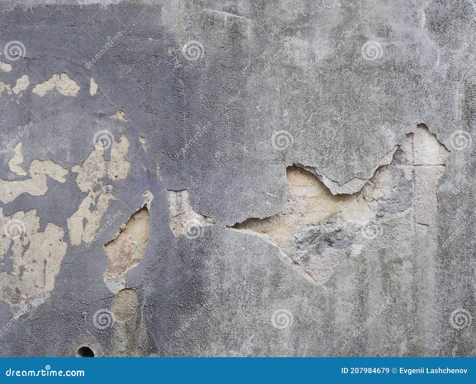 Concrete Wall with a Piece of Plaster that Has Fallen Off and Small ...