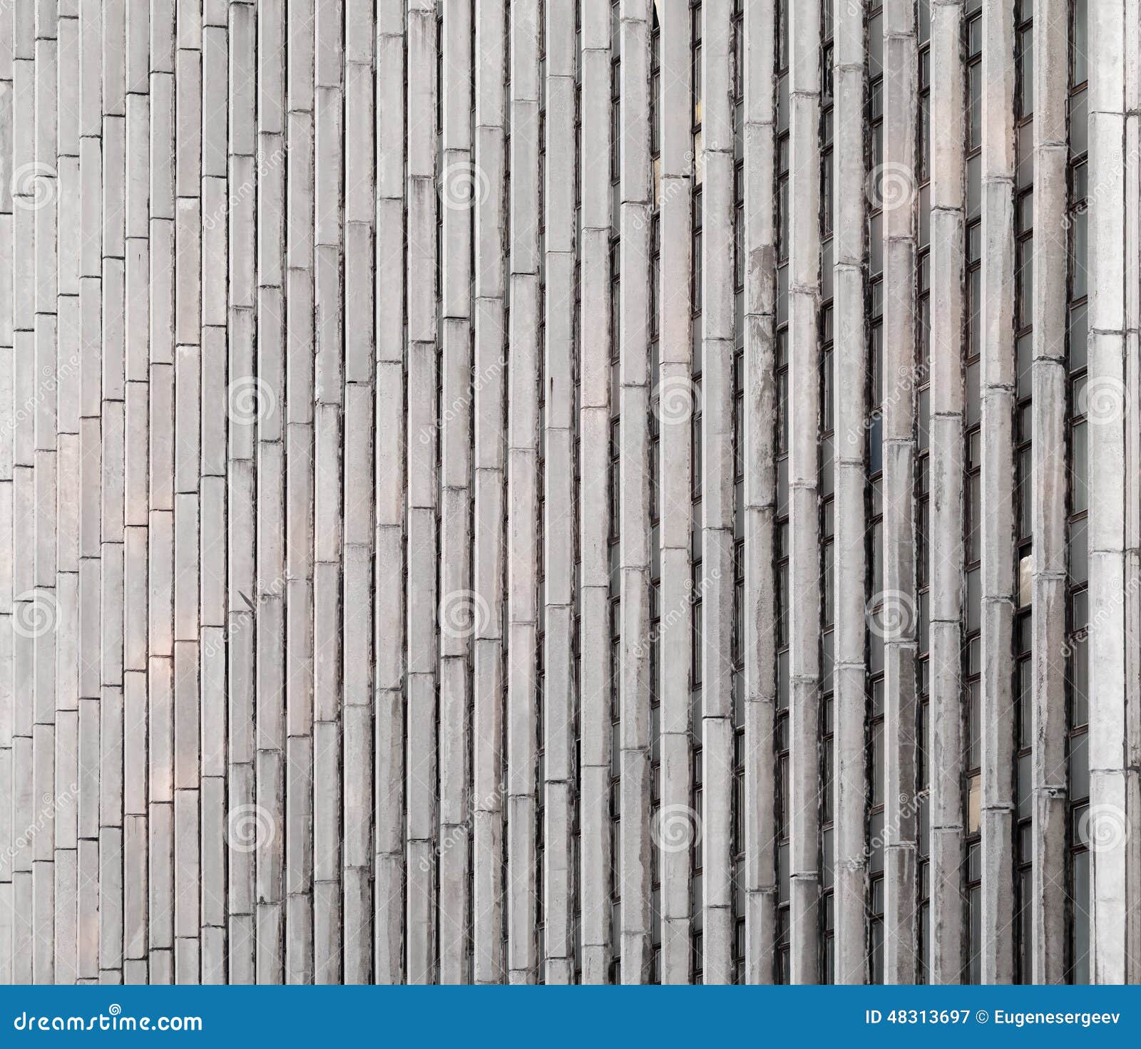 Concrete Wall with Vertical Lines and Windows Stock Image - Image of ...