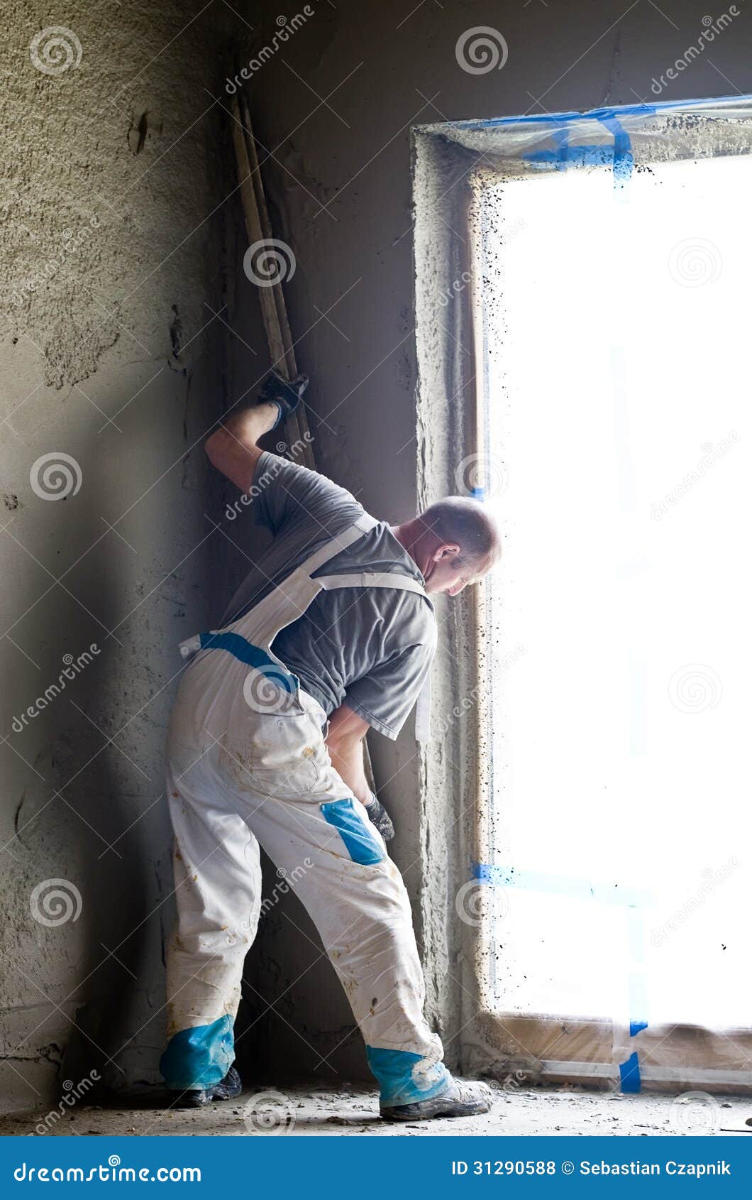 Concrete wall worker stock photo. Image of building, renovation - 31290588