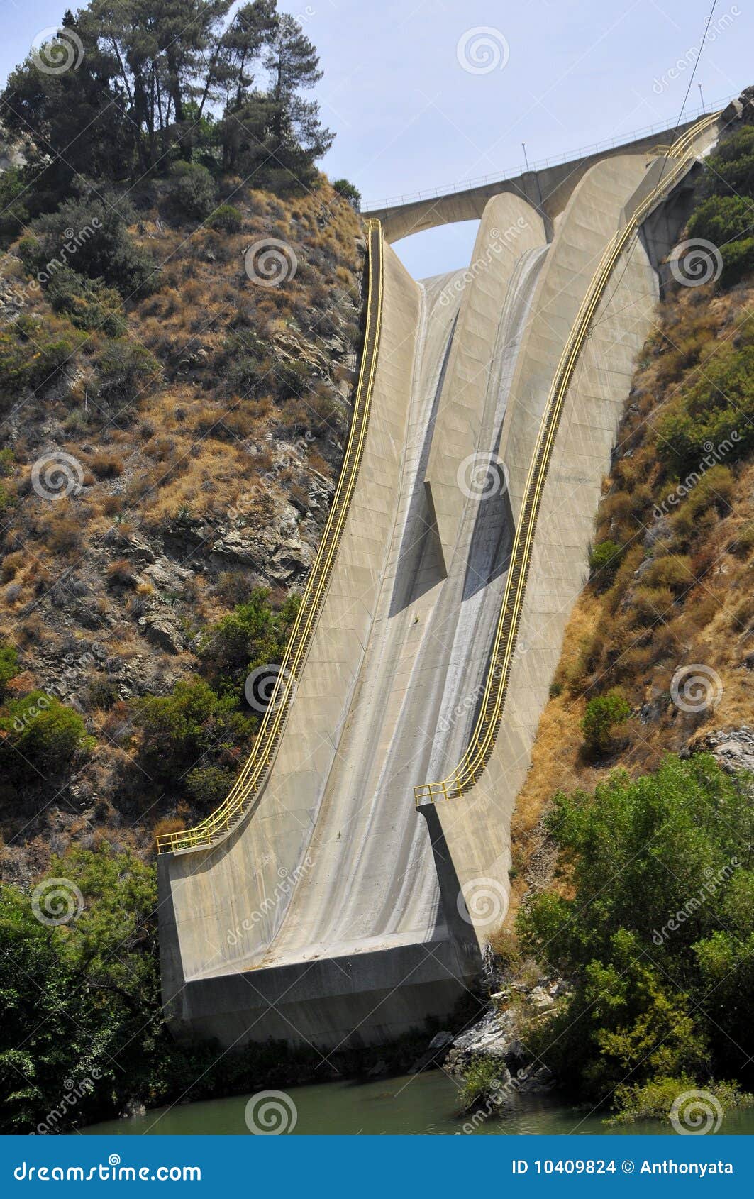 Concrete Water Spillway stock photo. Image of hillside - 10409824