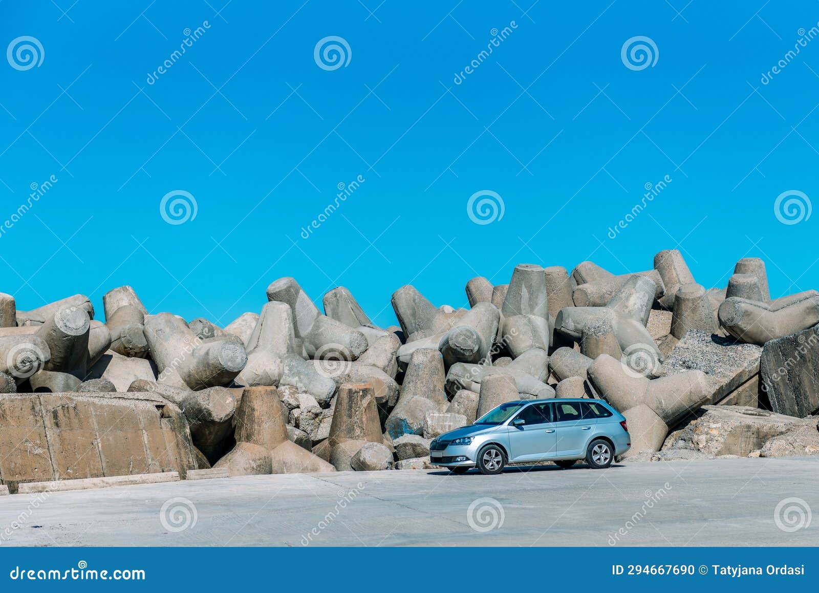Concrete Wave Brakers on the Coastline with Car Stock Photo - Image of ...