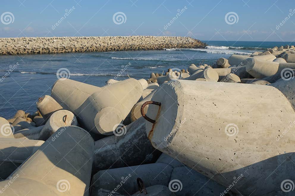 Concrete Wave Breakers on the Beach with Abstract Shapes, Patterns and ...