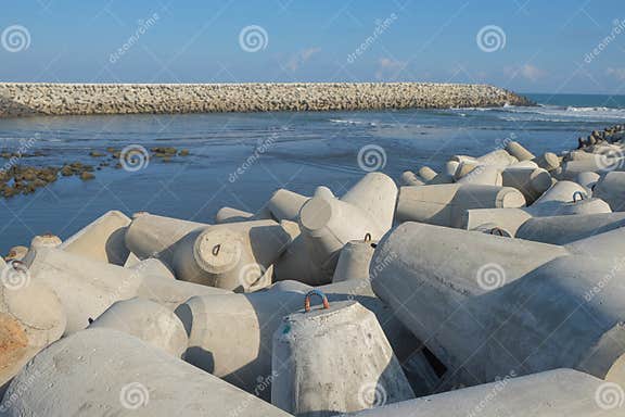 Concrete Wave Breakers on the Beach with Abstract Shapes, Patterns and ...