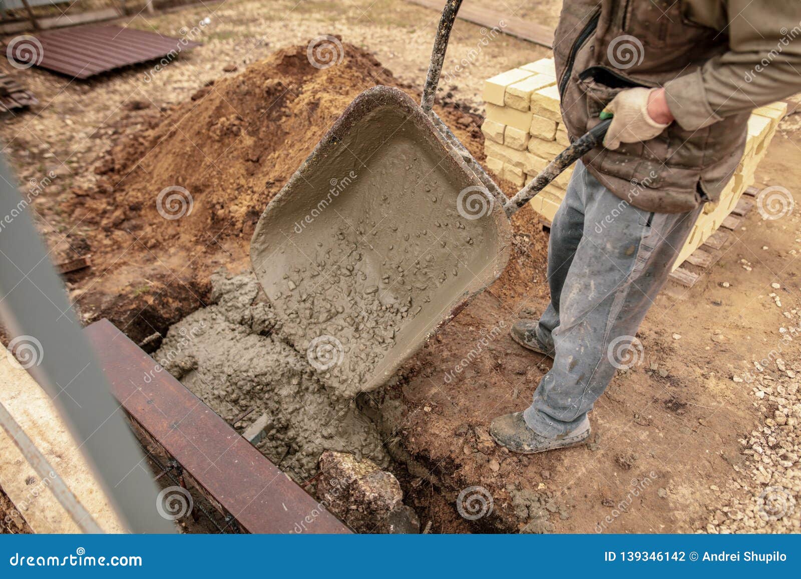 Concrete in a Wheelbarrow at a Construction Site Stock Photo - Image of ...