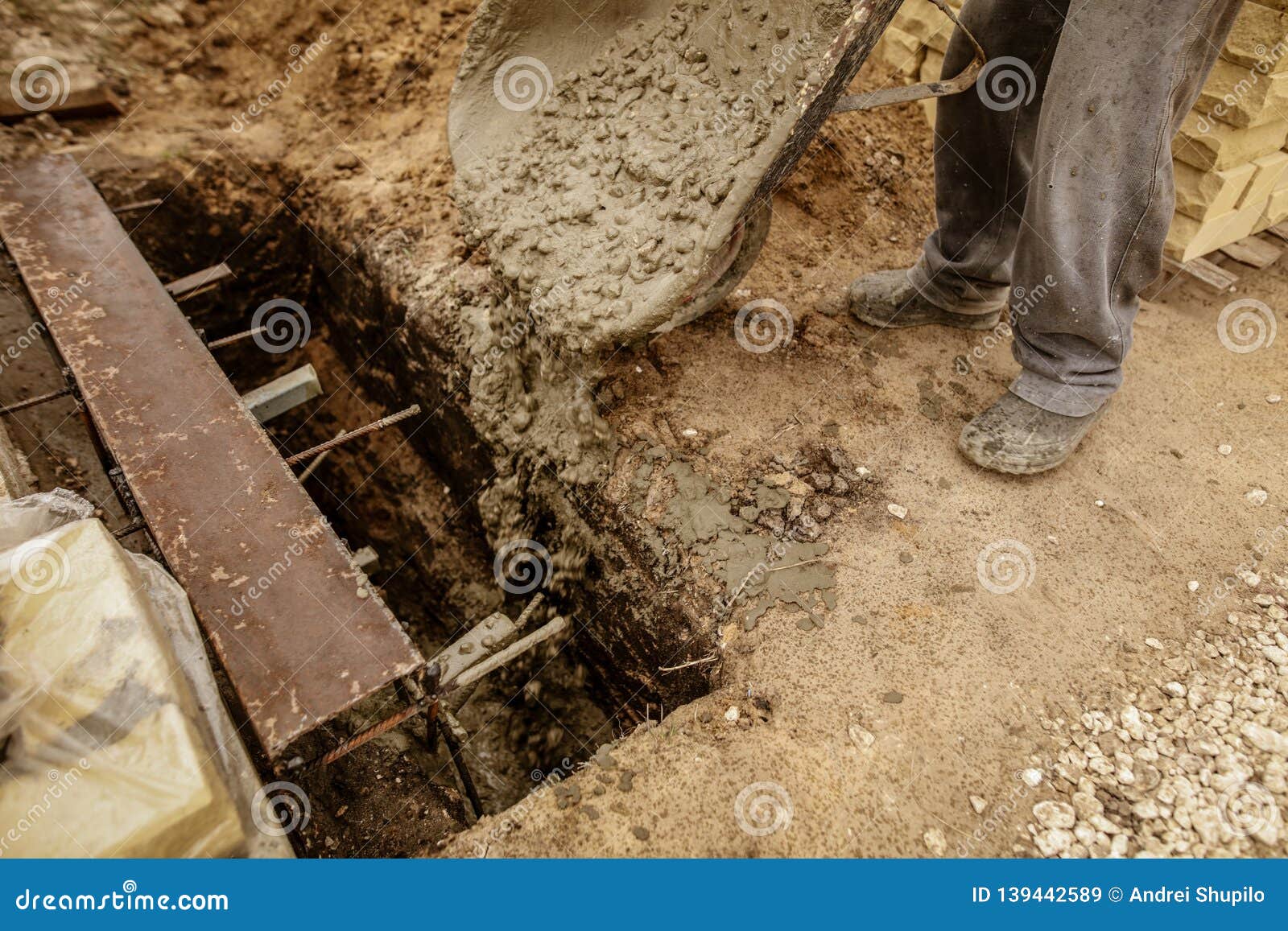Concrete in a Wheelbarrow at a Construction Site Stock Image - Image of ...