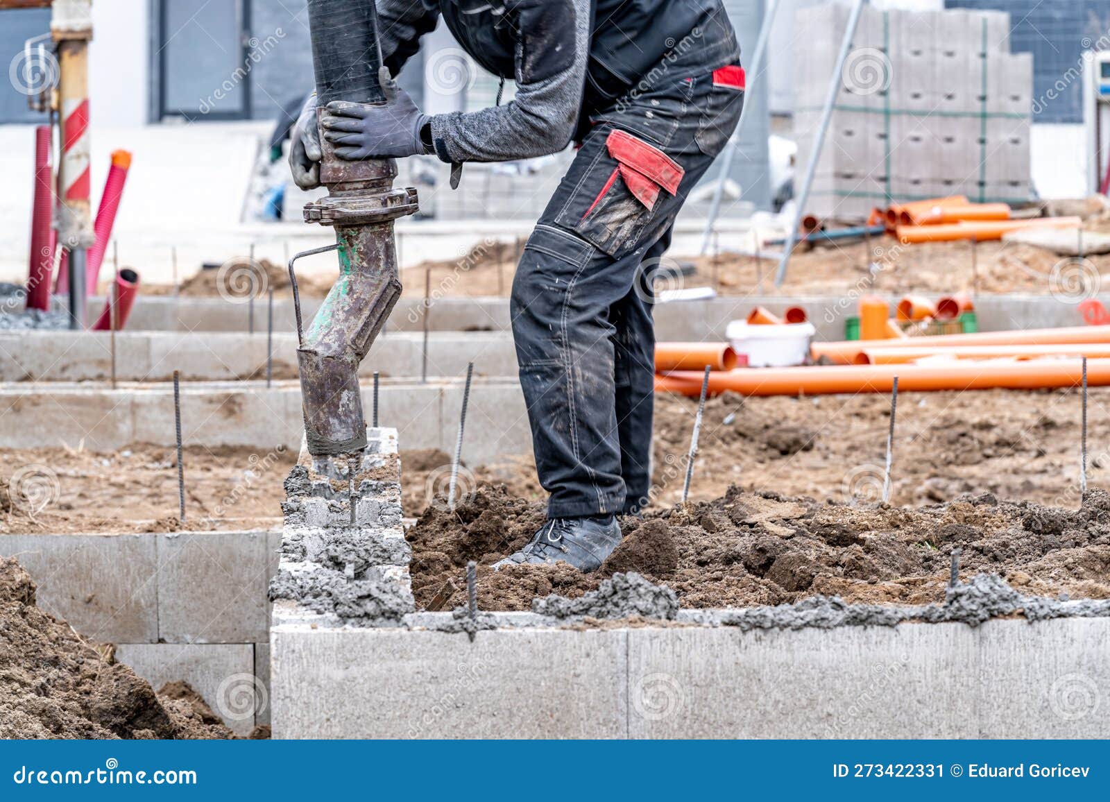 Concreting from the Pipe of the Foundation of the Building from the ...