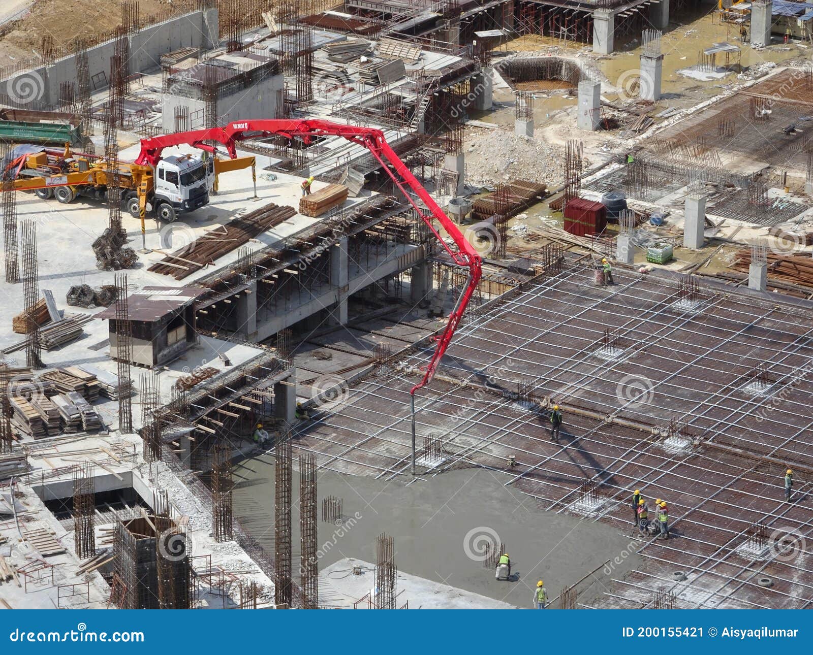 Concreting Work by Construction Workers at the Construction Site ...