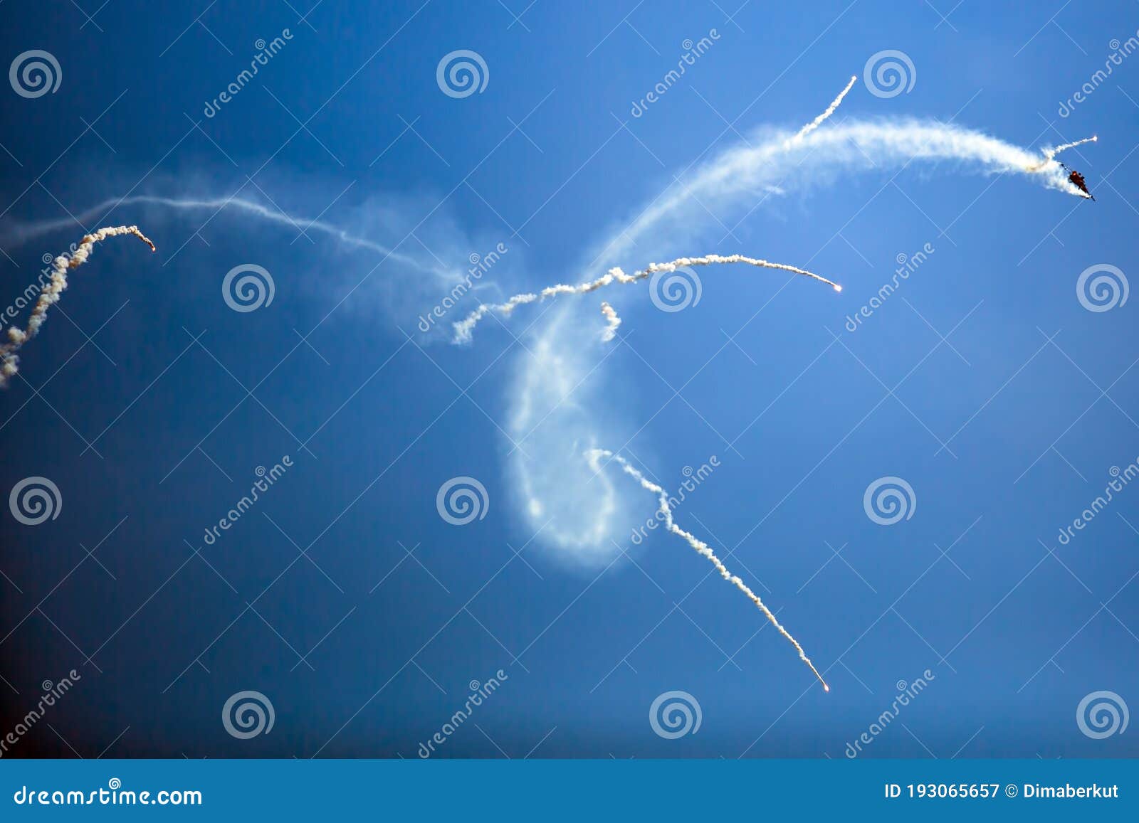 Condensation Marks on the Blue Sky from Jet Planes. Stock Image - Image ...