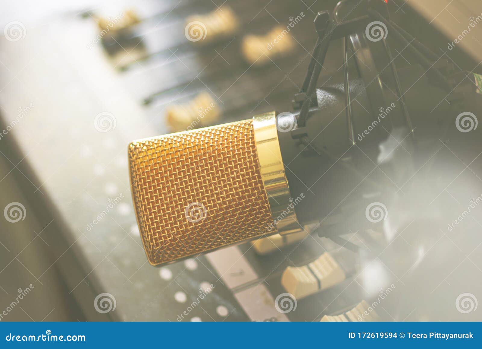 Condenser Microphone on a Stand Attached To a Table in a Professional ...