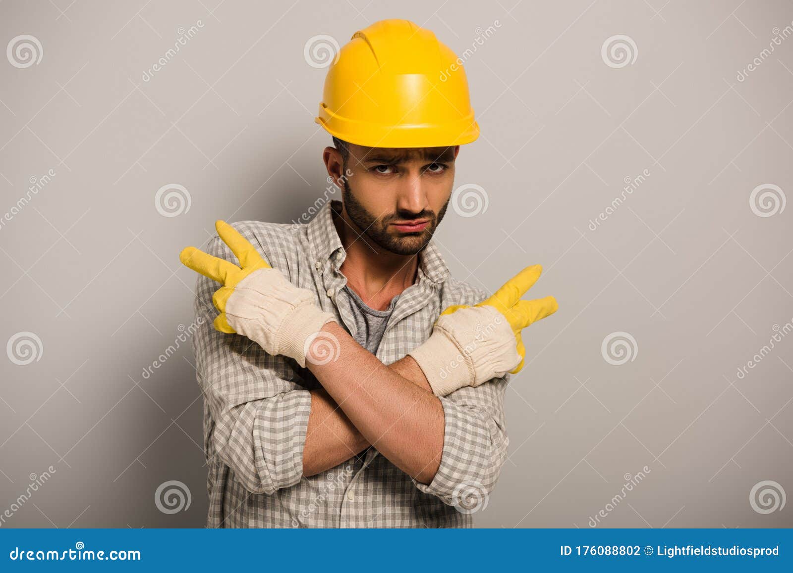 Workman in Yellow Helmet and Gloves Stock Photo - Image of hardhat ...