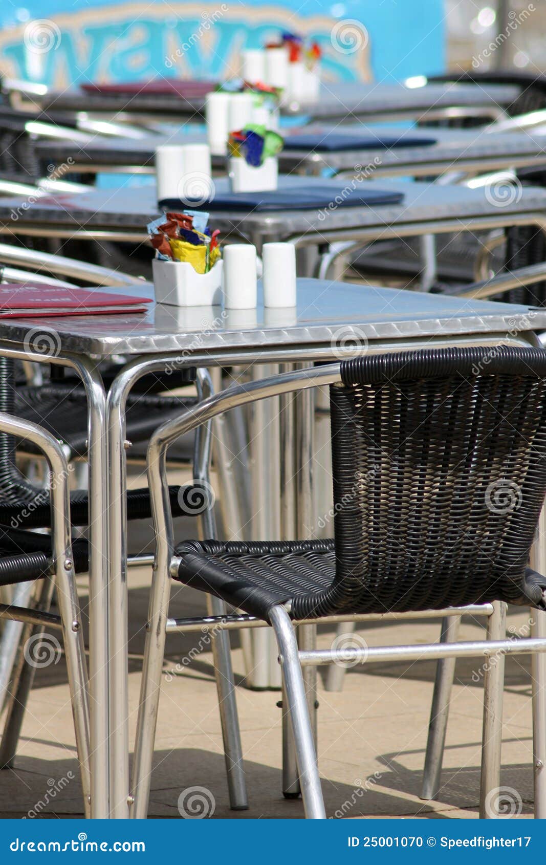 Condiments on cafe tables stock photo. Image of colors - 25001070