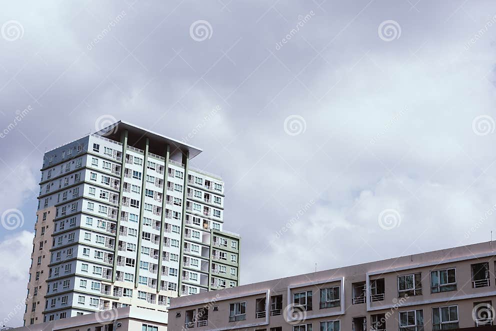 Image of Condo Building and Blue Sky Background. Stock Image - Image of ...