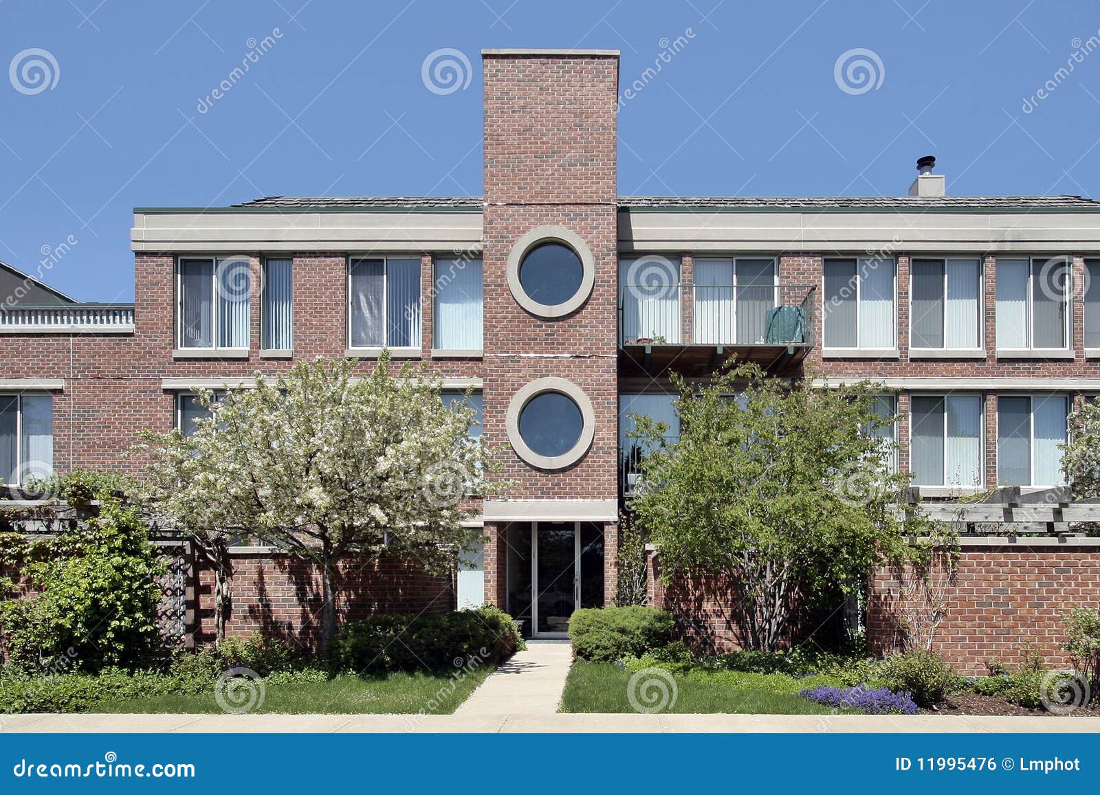 Condo Building with Oval Windows Stock Photo - Image of front ...