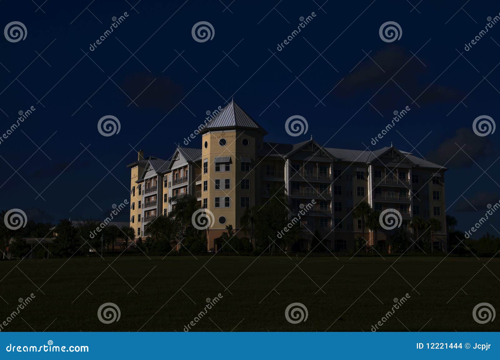 Condo at Night stock photo. Image of green, landscape - 12221444