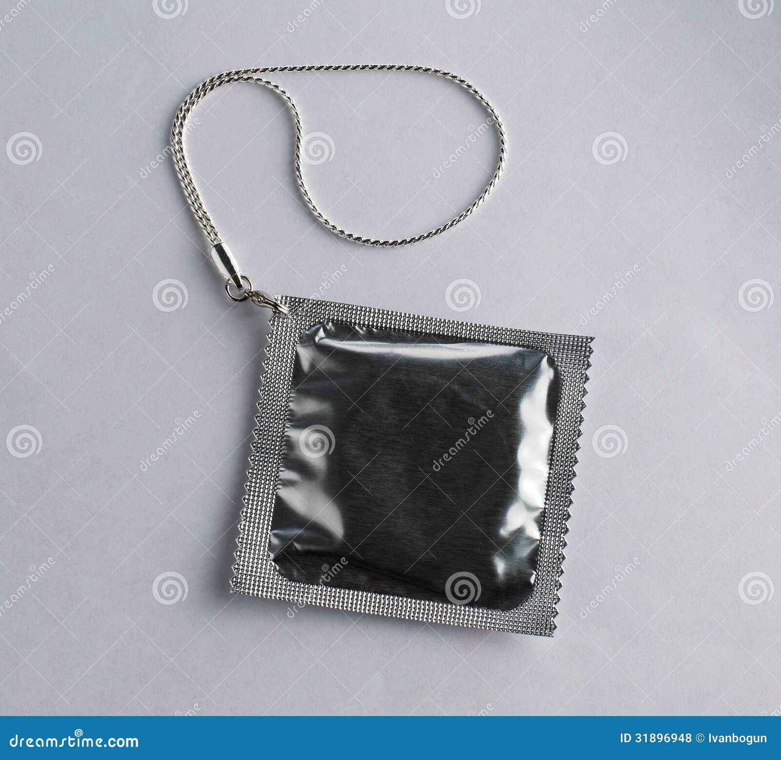 Condom with chain stock photo. Image of health, creative - 31896948