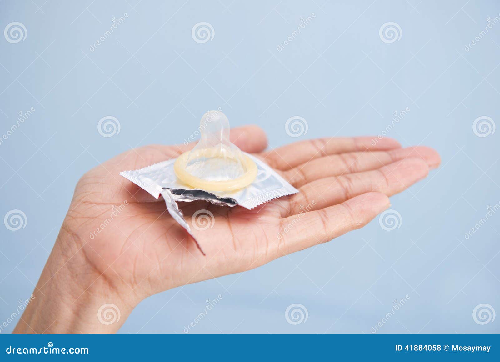 Condom on plam stock photo. Image of contraceptive, pack - 41884058