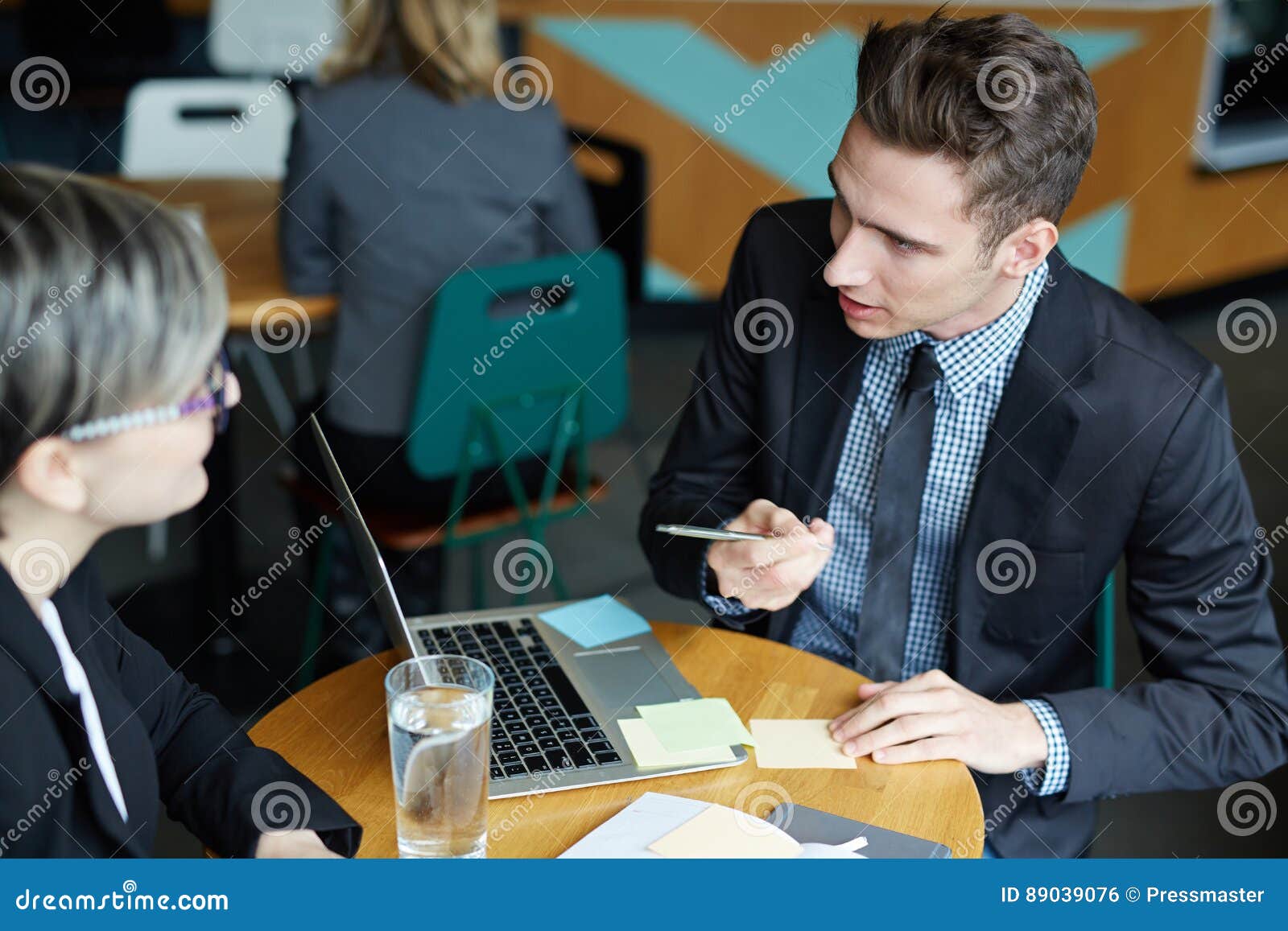 Conducting Interview in Cafe Stock Photo - Image of businesswoman ...