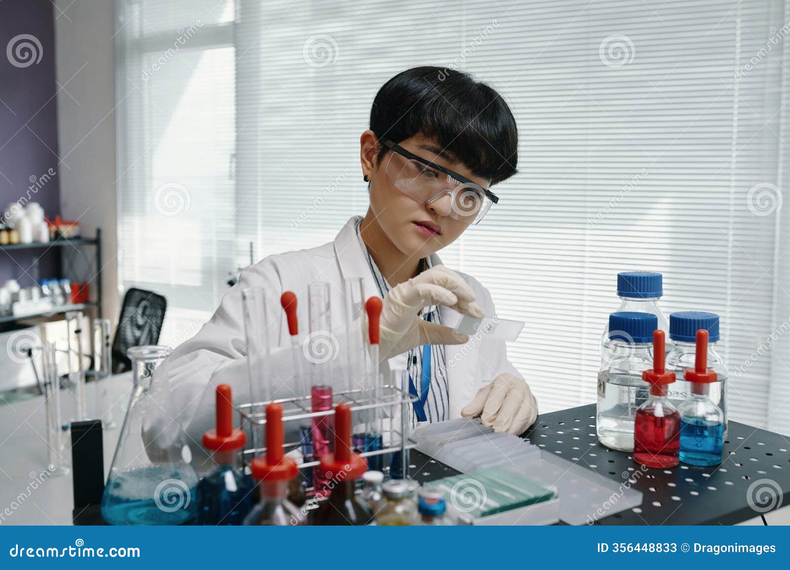 Conducting Laboratory Experiment in Controlled Environment Stock Image ...