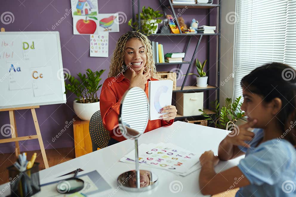Conducting Language Learning Session in Bright Classroom Setting Stock ...