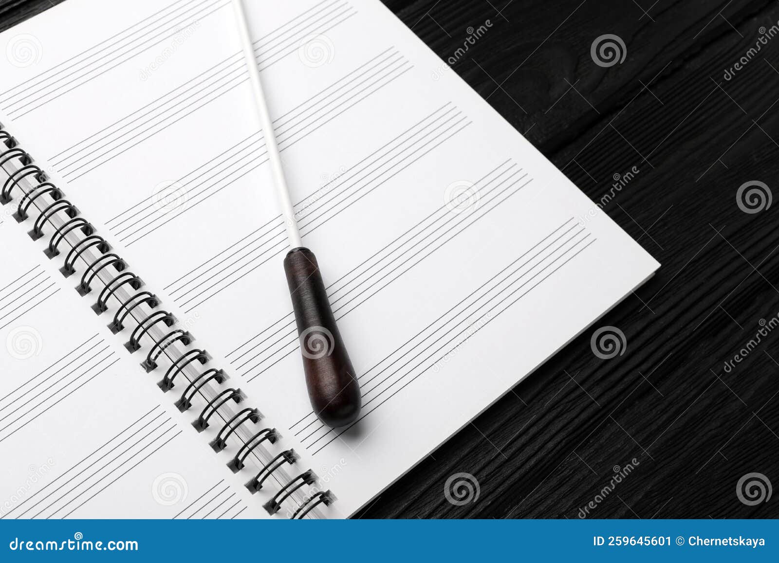 Conductor`s Baton and Lead Sheet on Black Wooden Table Stock Image ...
