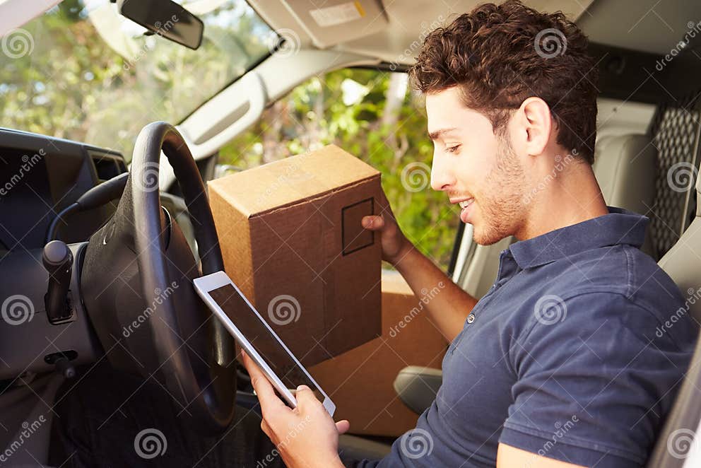 Conductor Sitting in Van Using Digital Tablet De La Entrega Foto de ...