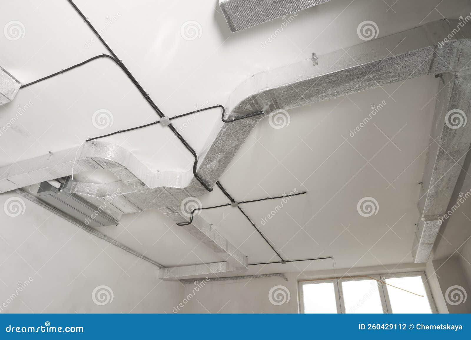 Conduits with Cables and Ventilation System on White Ceiling, Low Angle ...