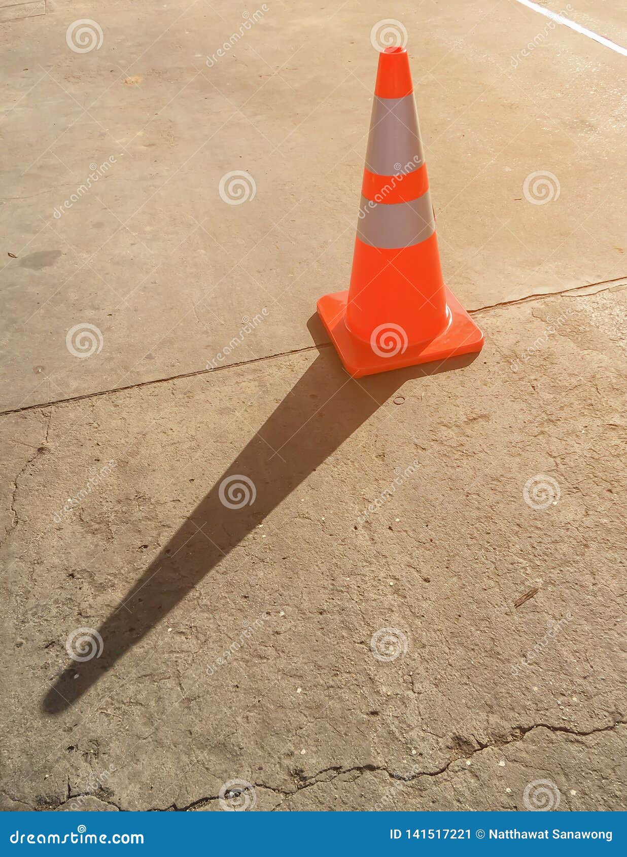Cone on the cement road stock image. Image of concrete - 141517221
