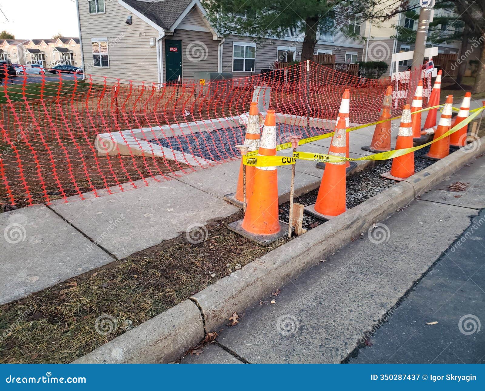 Cone and Mesh Fencing on the Sidewalk. Construction of Bus Stop and ...