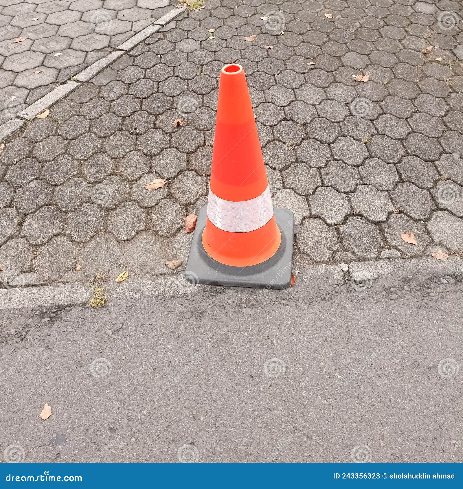 Cone on paving blocks stock image. Image of floor, infrastructure ...