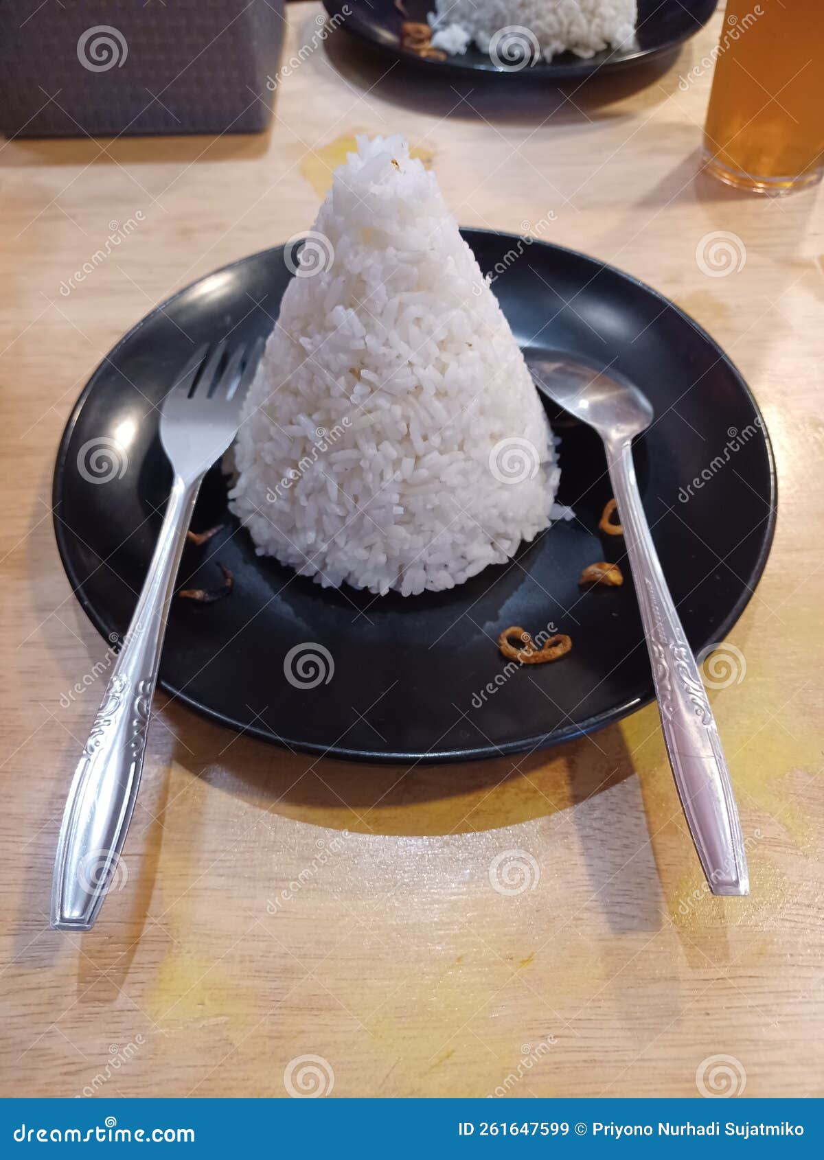 Cone-shaped White Rice with Spoon and Fork Stock Image - Image of ...