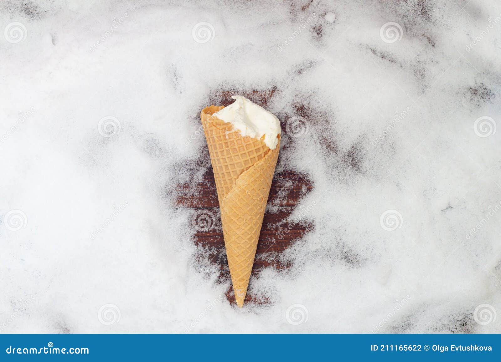 A Cone with a White Ice Cream Sundae in the Snow Stock Photo - Image of ...