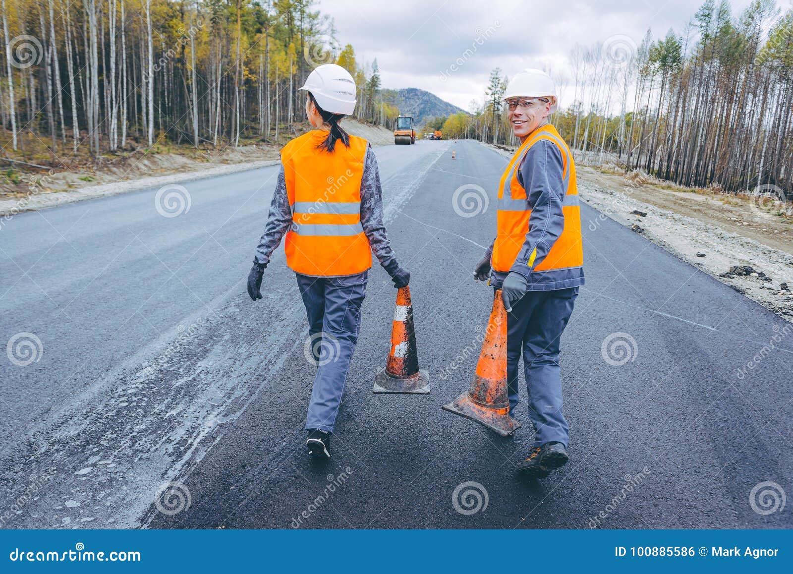 Cone worker asphalting stock photo. Image of maintenanace - 100885586