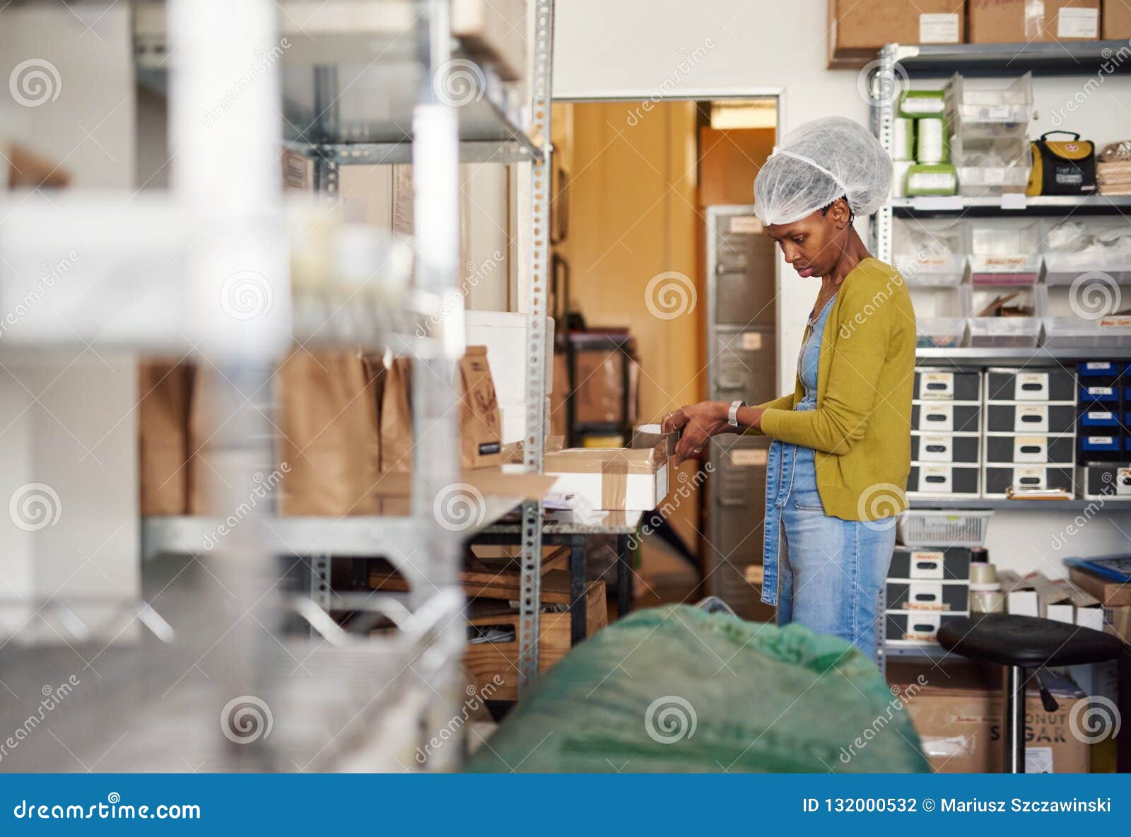 Confectionary Making Factory Worker Preparing Boxes of Chocolate for ...