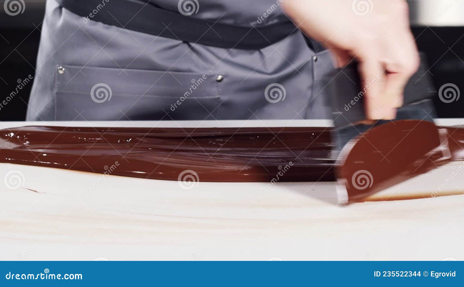 Confectioner Chocolate Tempering. Woman Chef in Uniform Tempering ...