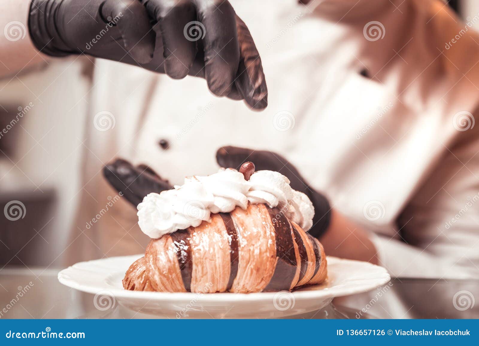 Confectioner Decorating the Croissant with Coffee Beans Stock Photo ...