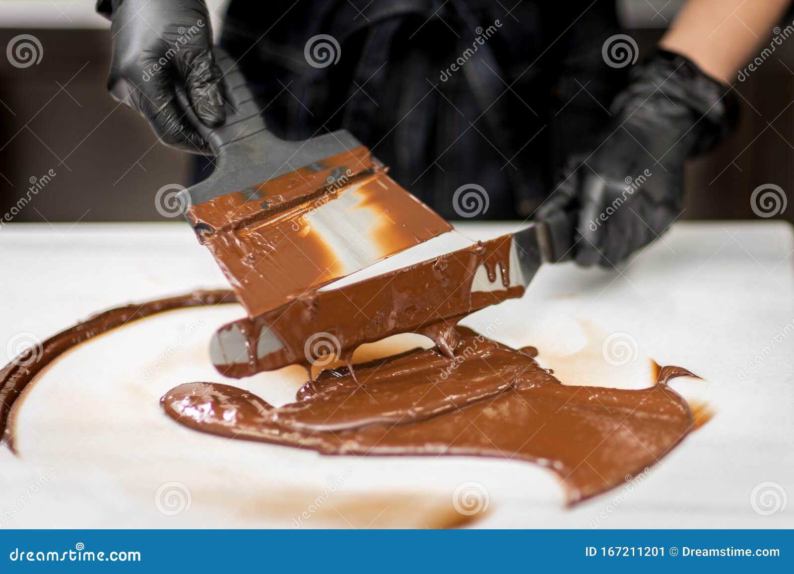 Confectioner in Gloves Makes Chocolates in Forms Stock Image - Image of ...