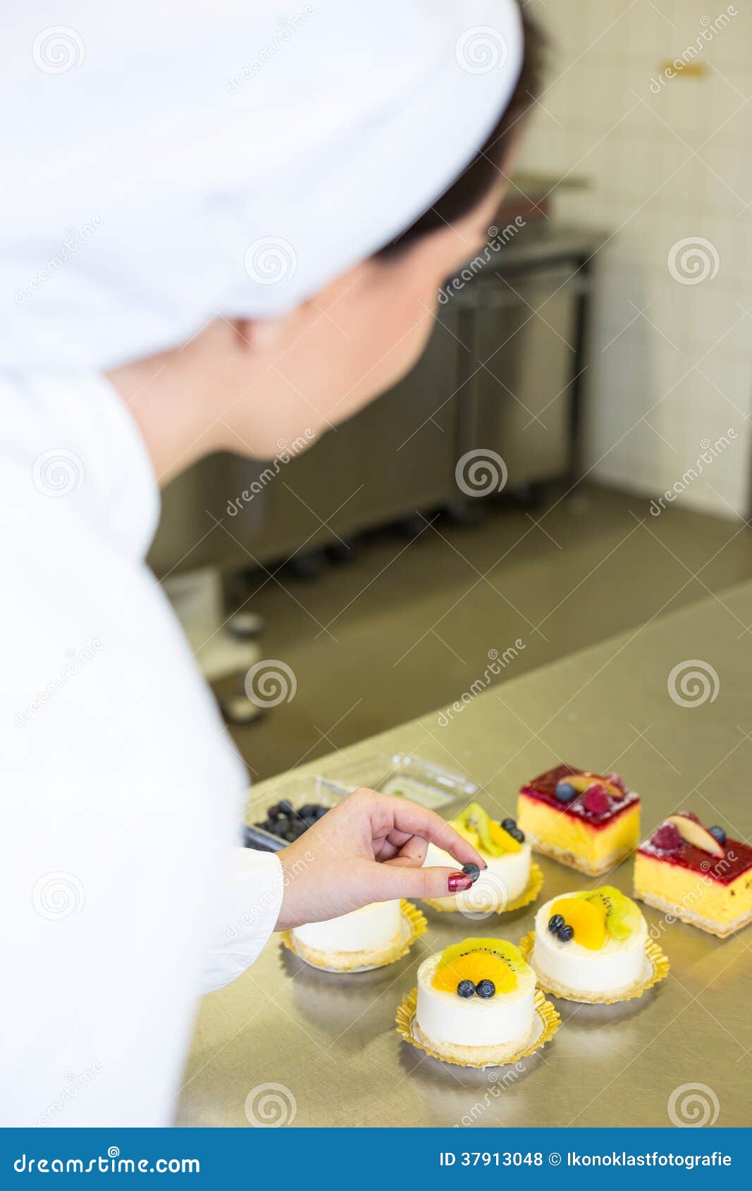 Confectioner Preparing Cakes at Bakery or Confectionery Stock Photo ...