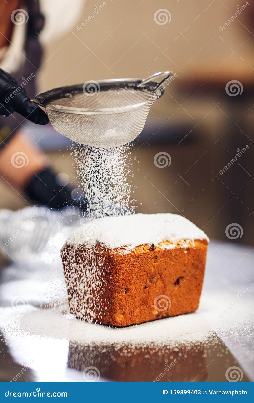 Confectioner Sprinkles Easter Cake with Icing Sugar through Sieve ...